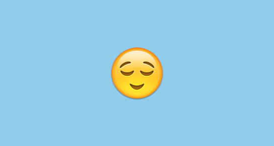 😌 Relieved Face Emoji on Apple iOS 8.3